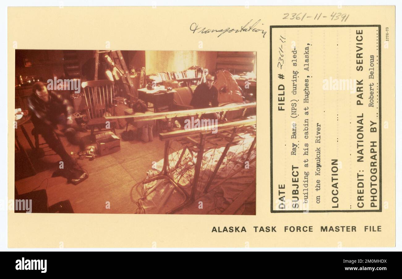 Ray Bane (NPS) during sled-building at his cabin at Hughes, Alaska, on ...