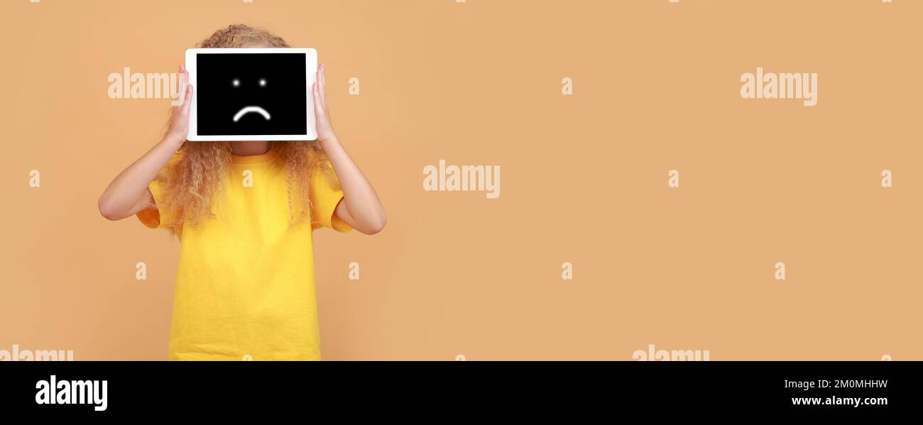 banner of frustrated child girl is holding up a digital tablet with a ...