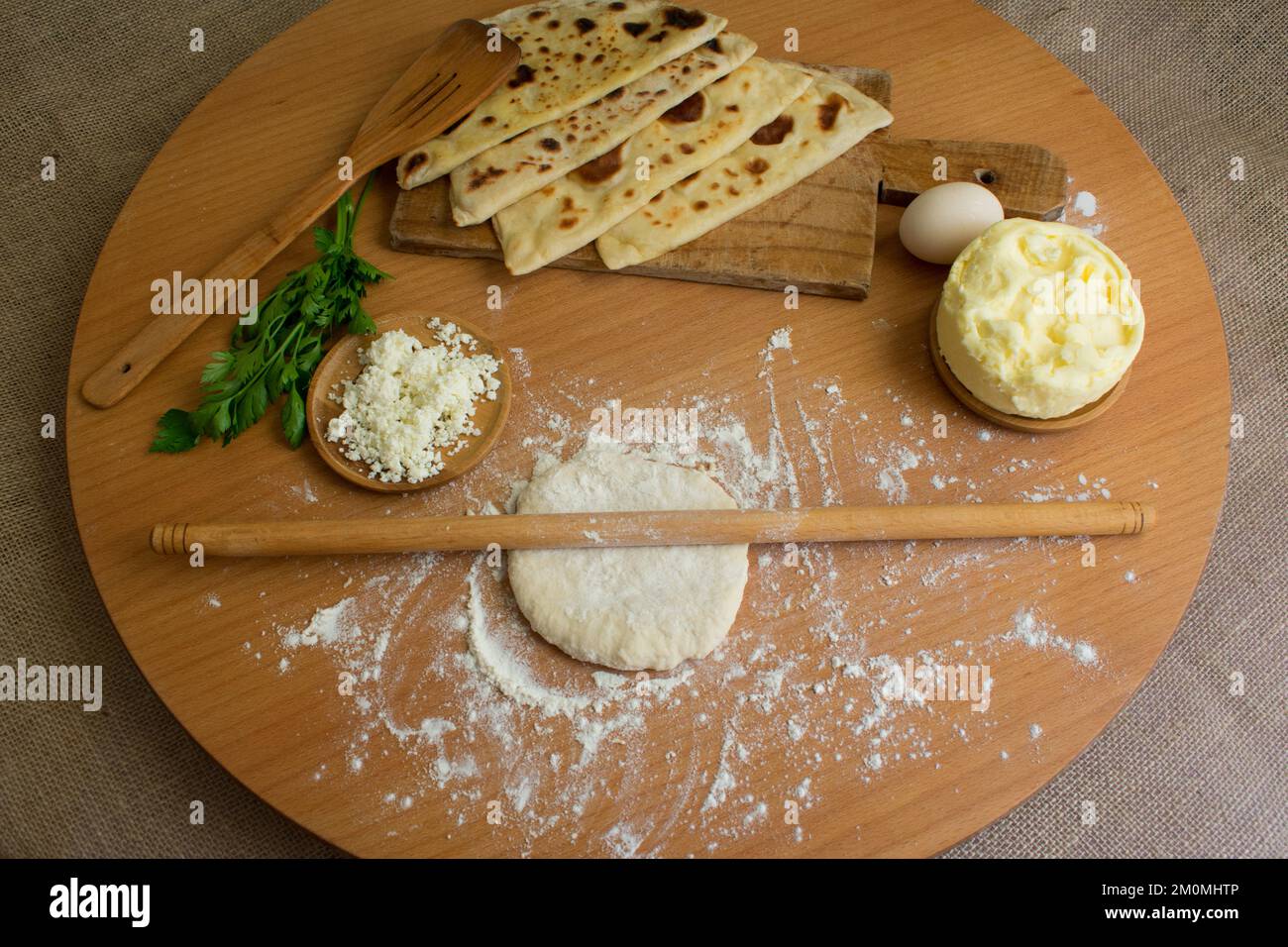 Curd cheese and parsley between butter dough, handmade Turkish ...