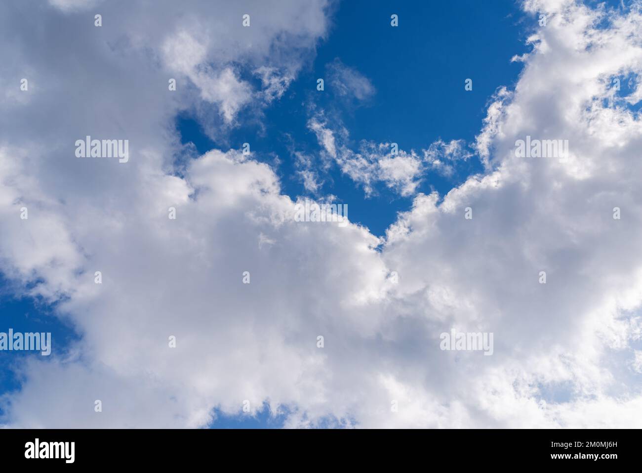 Dramatic blue sky with white clouds Stock Photo - Alamy