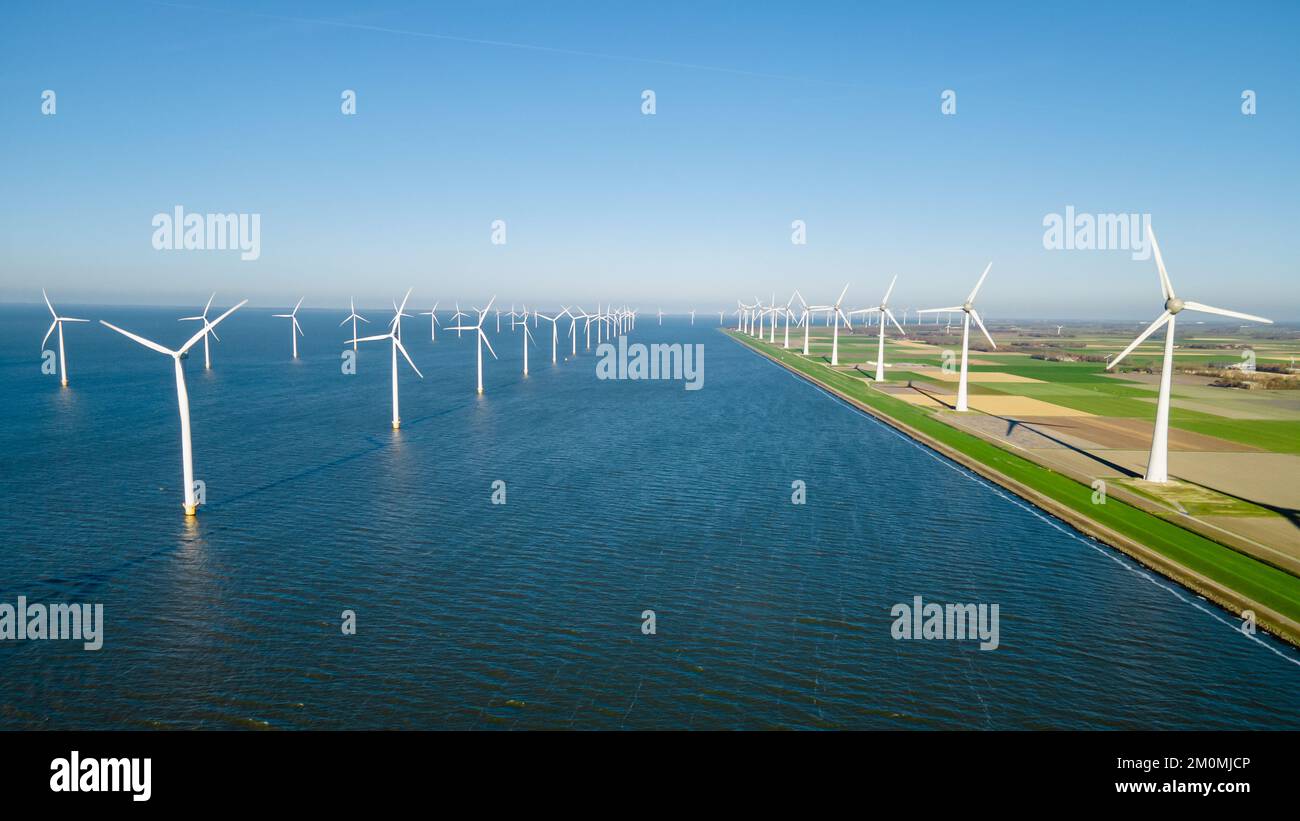 Drone view at Windmill park with wind mill turbines generating ...