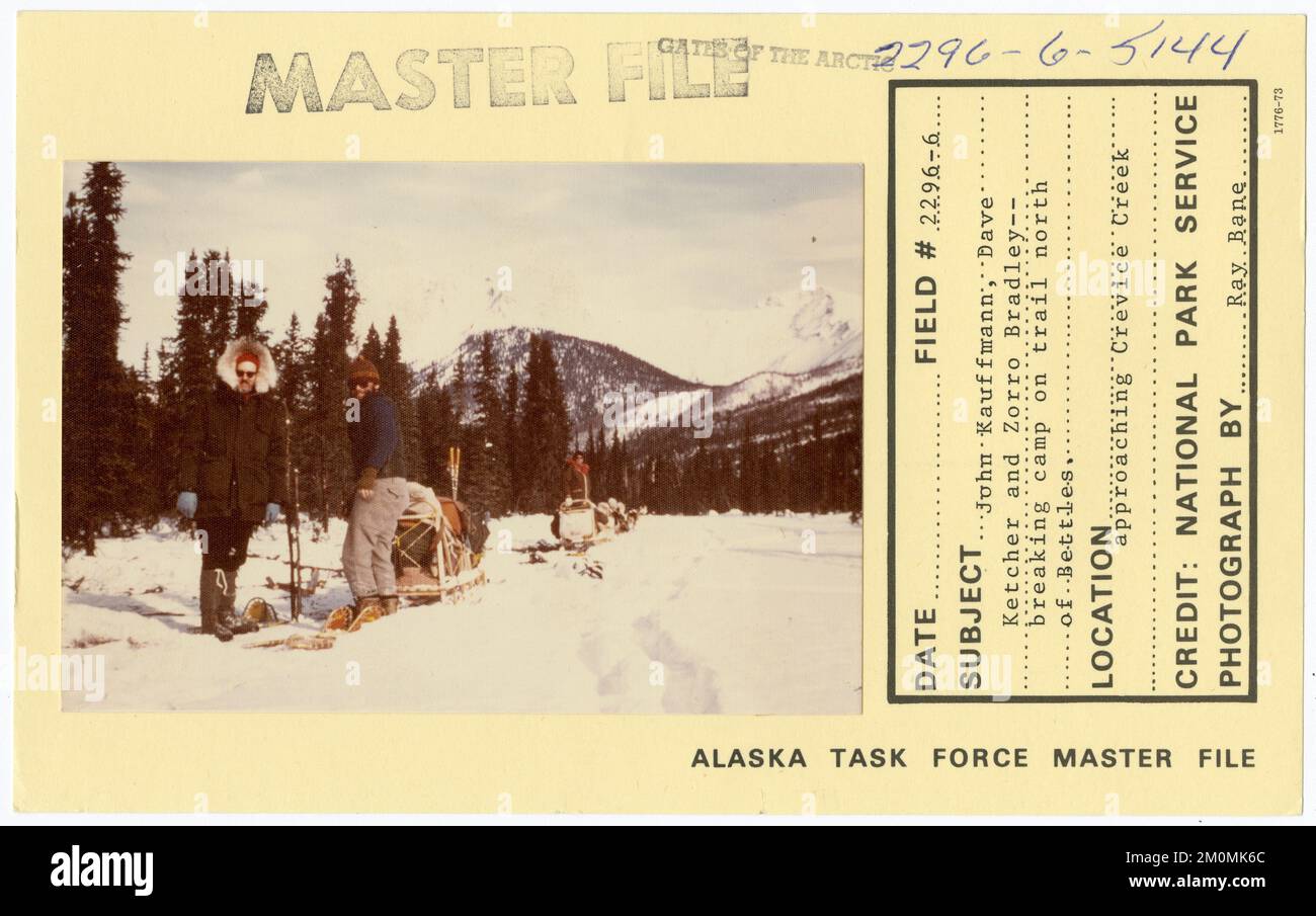 John Kauffmann, Dave Ketcher and Zorro Bradley - breaking camp on trail ...