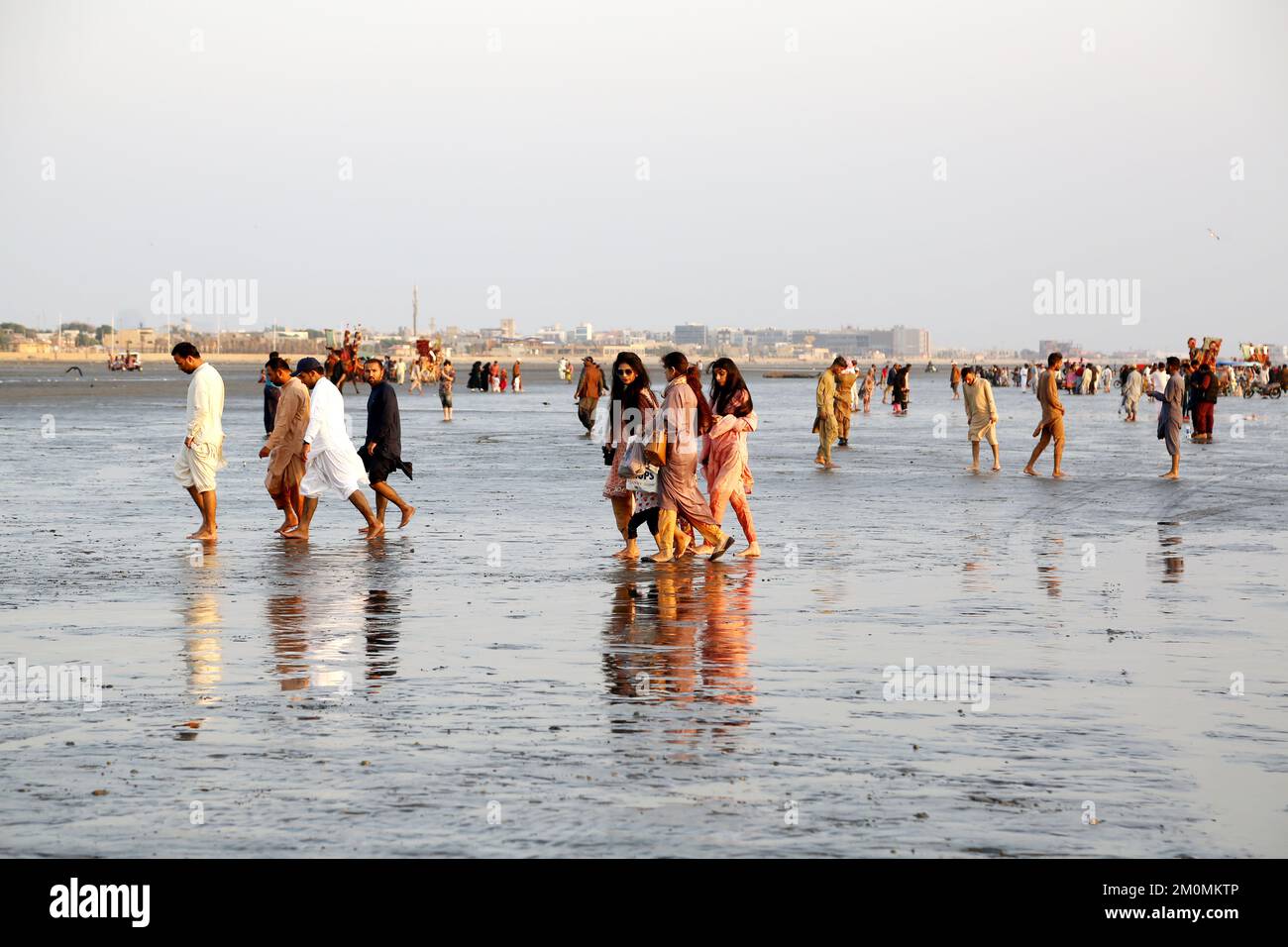 Karachi, Pakistan. 6th Dec, 2022. People visit Clifton beach in Karachi ...