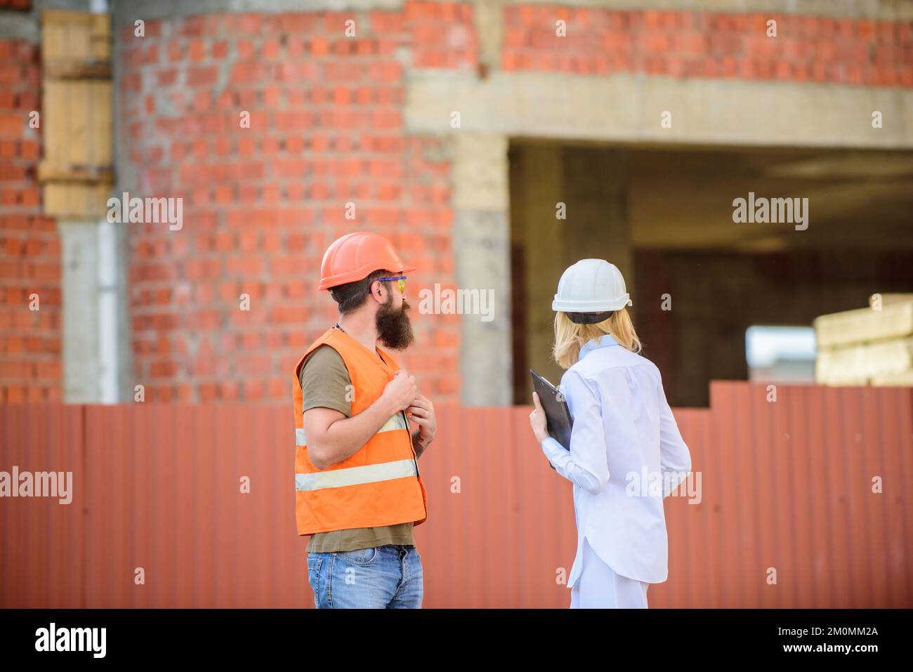 Construction site safety inspection. Discuss progress project. Safety ...