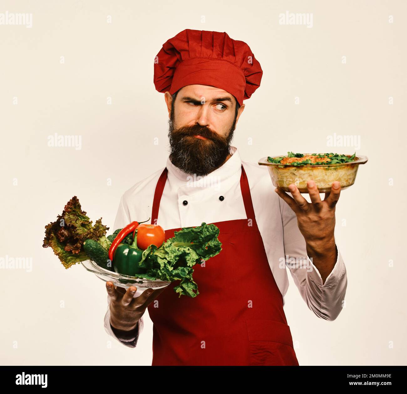 Man with beard on white background. Cook with suspicious face Stock ...