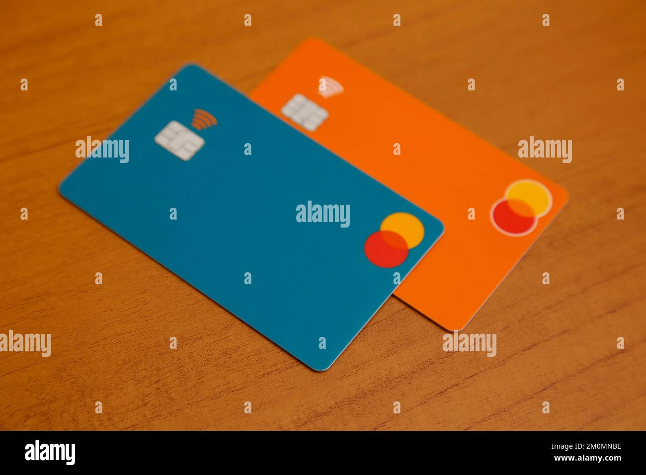 Minas Gerais, Brazil - July 09, 2022: green and orange credit cards ...