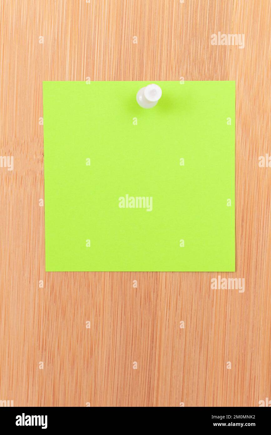 Green Sticky Note Pinned to the Wooden Message Board. To Do List ...