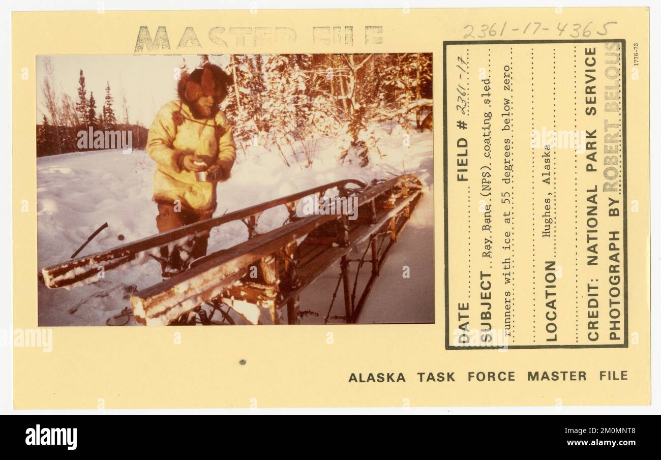 Ray Bane (NPS) coating sled runners with ice at 55 degrees below zero ...