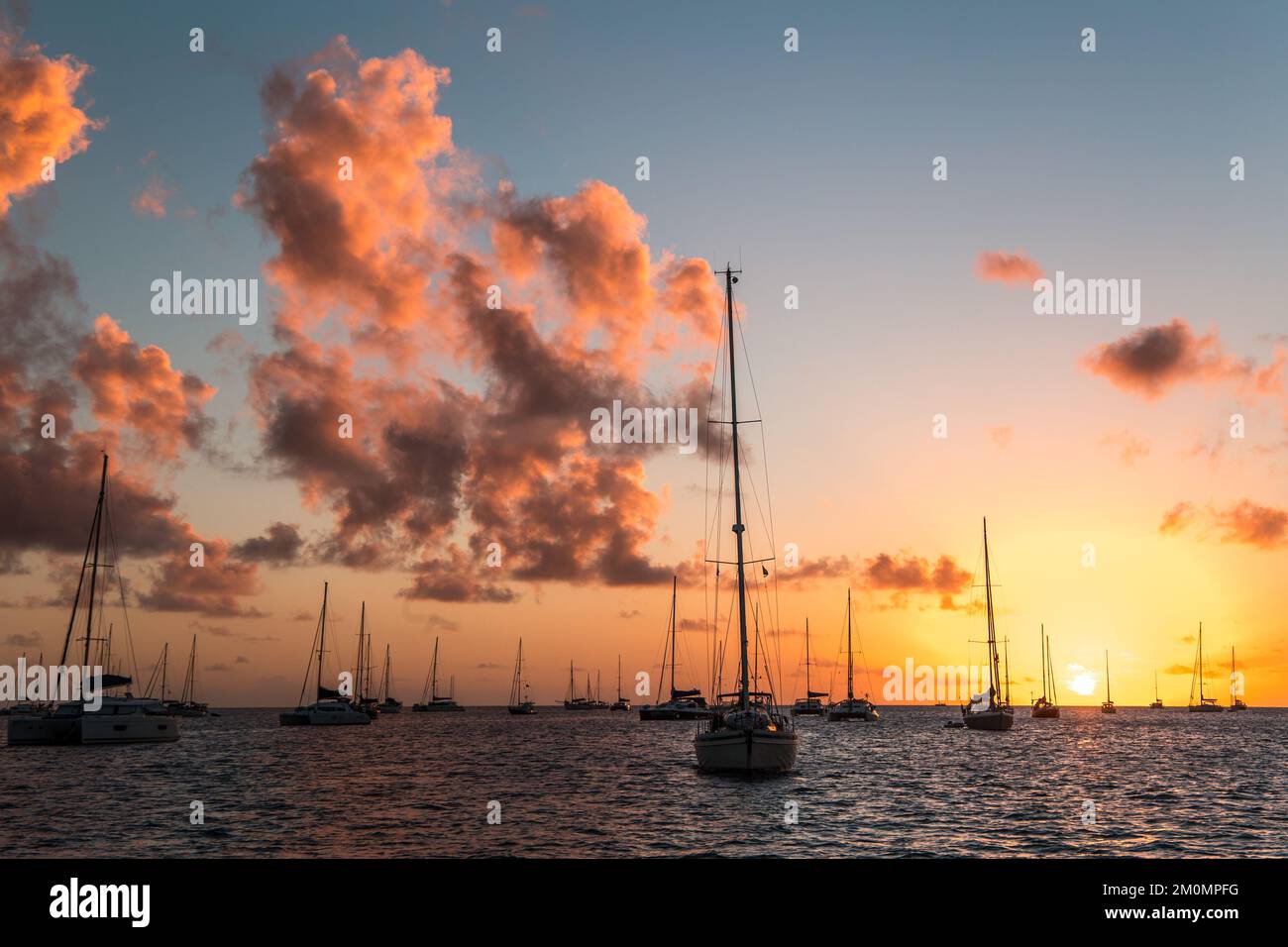 sunset view from a sailing boat in the caribbean Stock Photo - Alamy