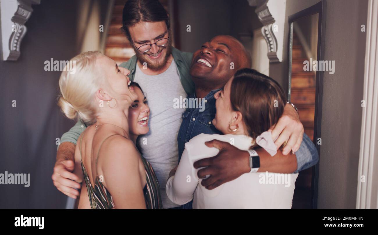 Friends, hug and love while happy and excited at a party or social ...