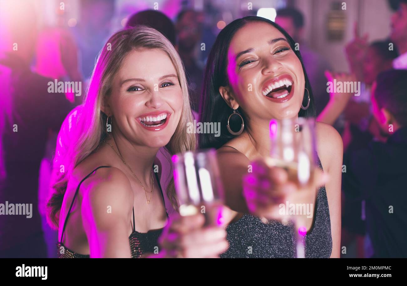 Portrait, party and toast with woman friends in a nightclub for a new ...