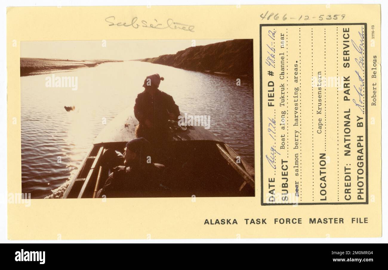 Boat along Tukruk Channel near salmon berry harvesting areas. Alaska ...