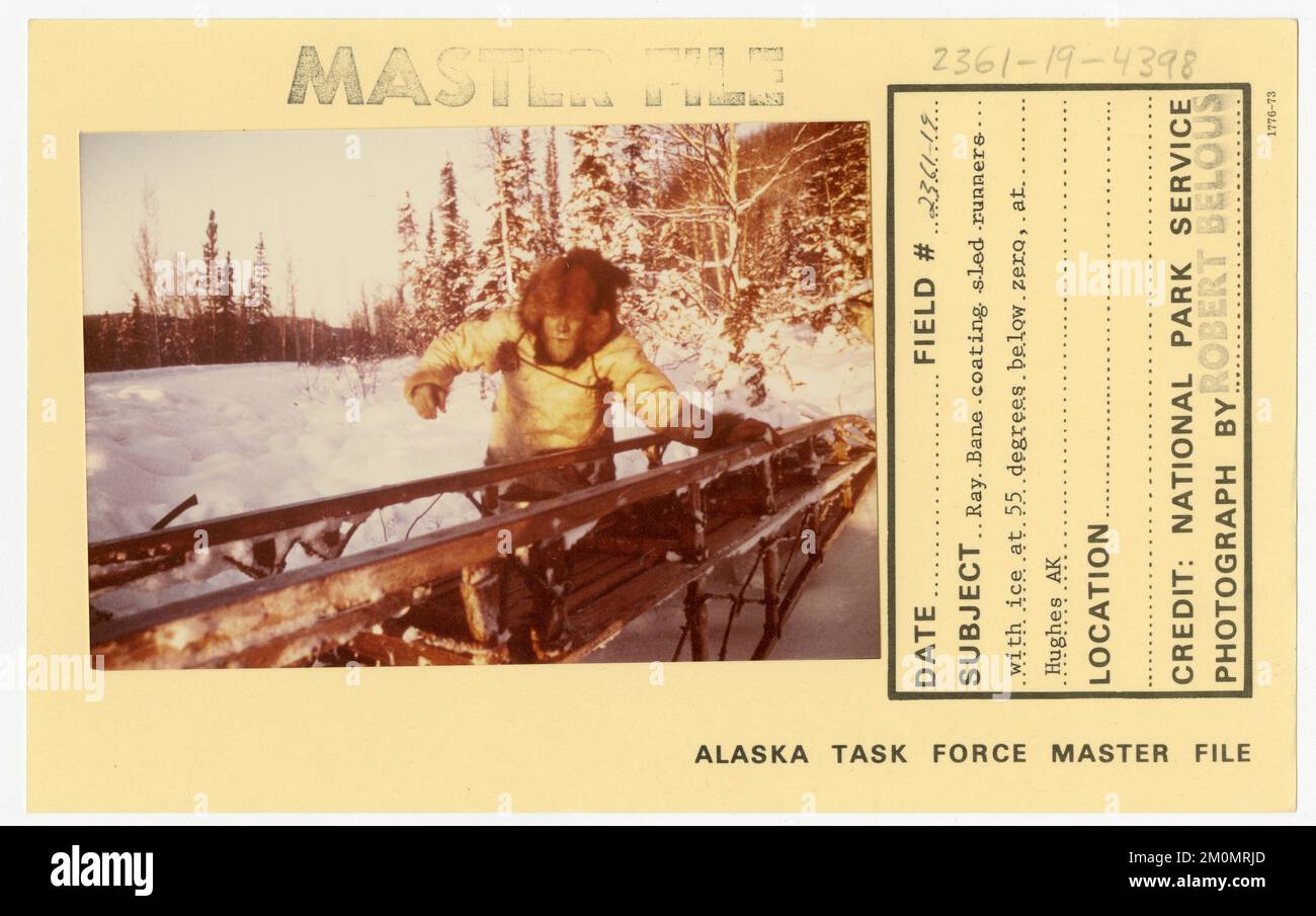 Ray Bane (NPS) coating sled runners with ice at 55 degrees below zero ...