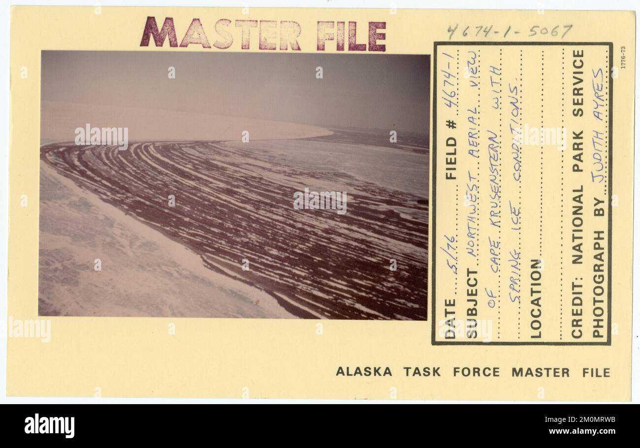 Northwest aerial view of Cape Krusenstern with spring ice conditions ...