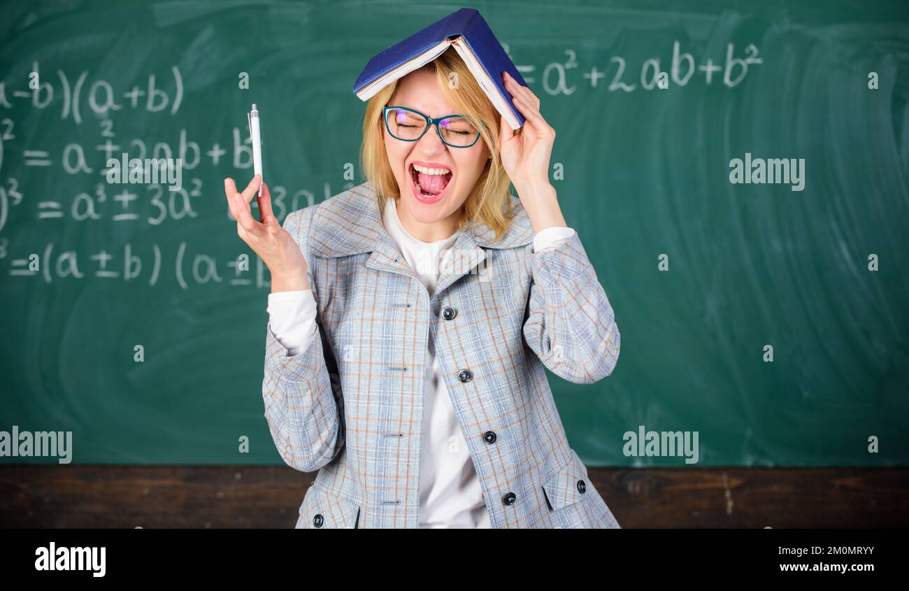 Keep in memory. Improve memory skill. Woman teacher with book as roof ...