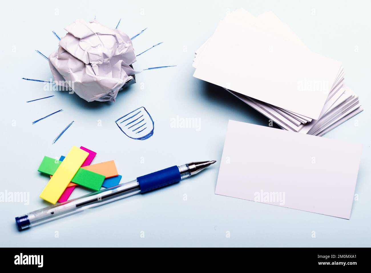 Wrinkled paper and drawn rays making light bulb Stock Photo - Alamy