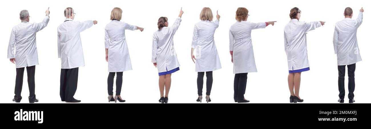 group of doctors standing with their backs isolated Stock Photo - Alamy