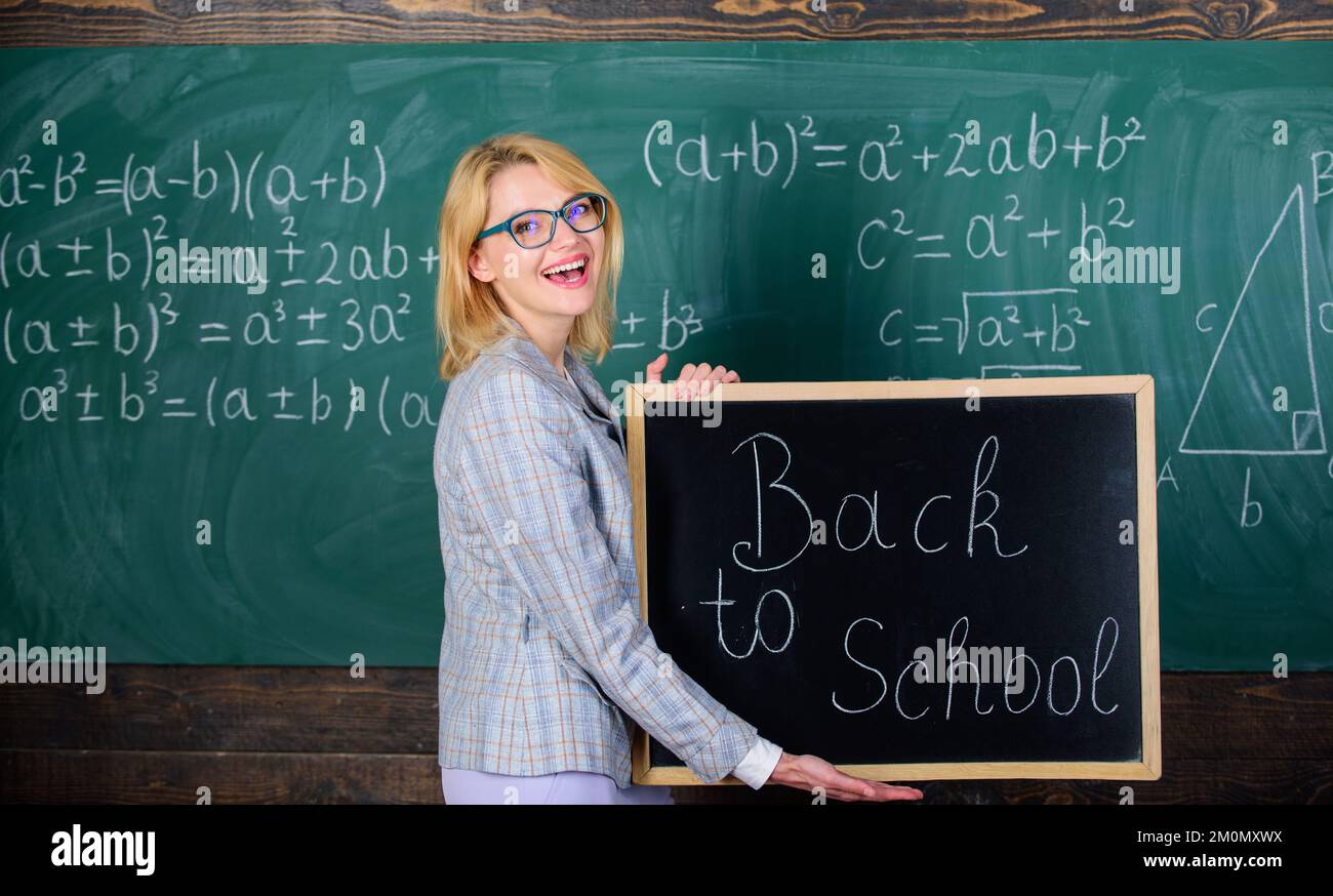 Top ways to welcome students back to school. Teacher woman hold ...