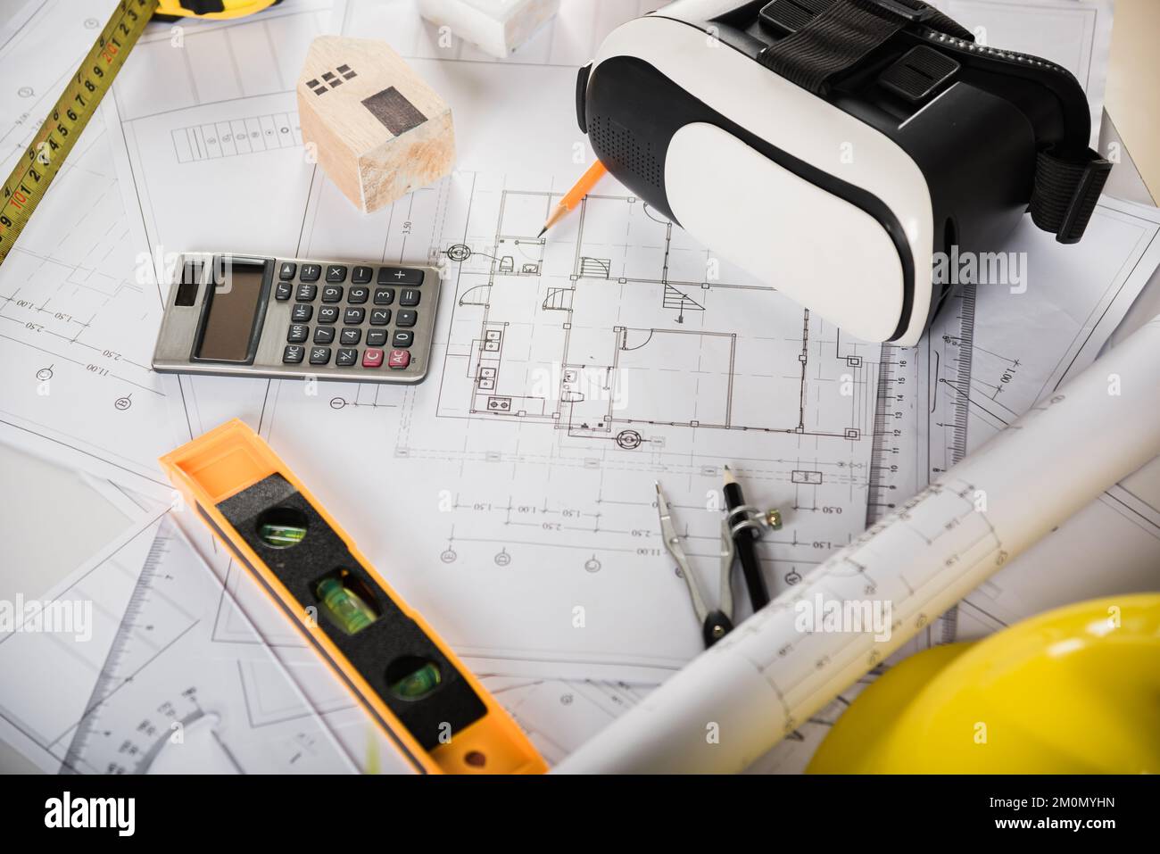 Architectural blueprint paper project plans on desk table Stock Photo ...