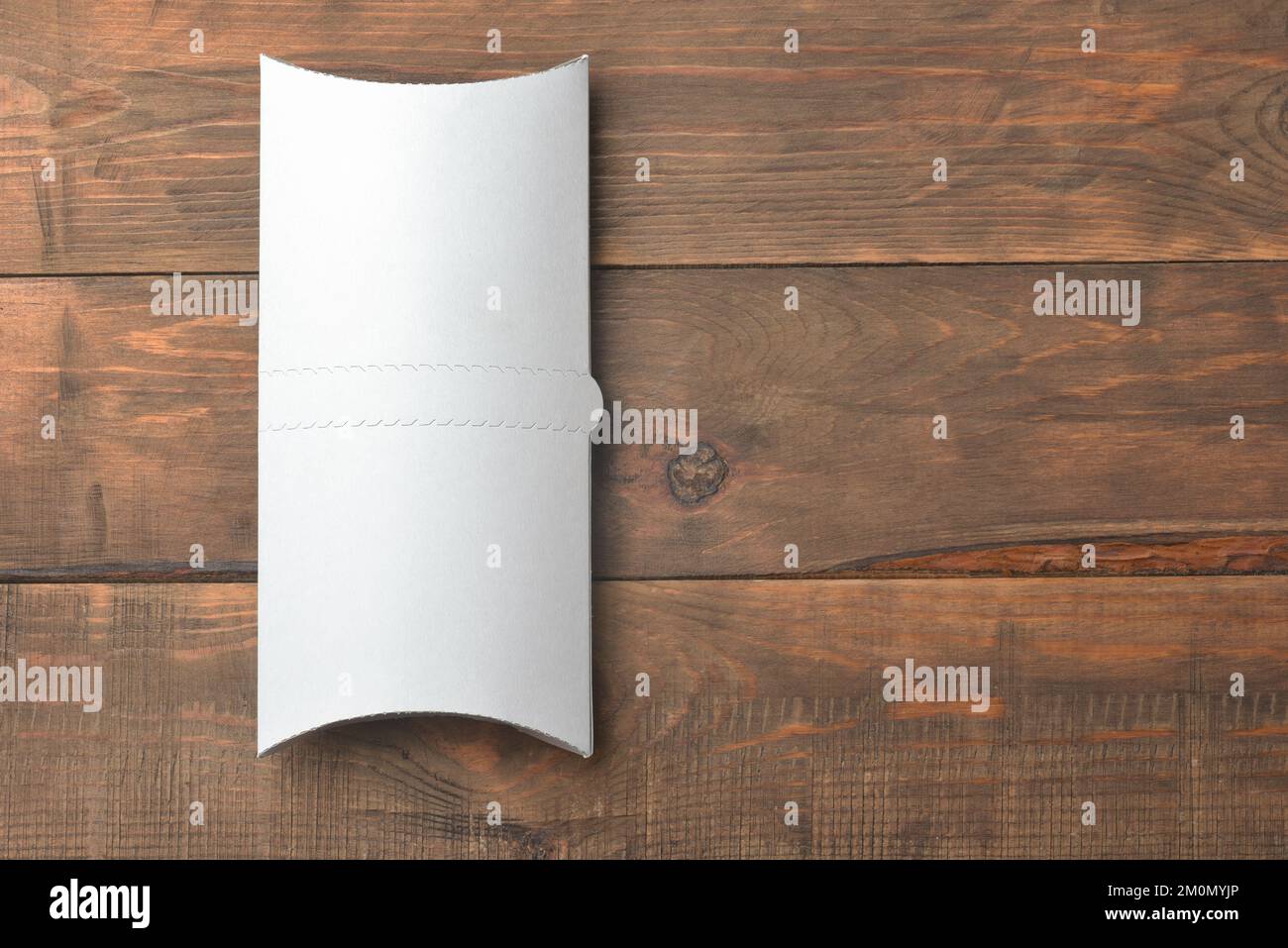 Top view of white blank doner kebab paper packaging on wooden ...