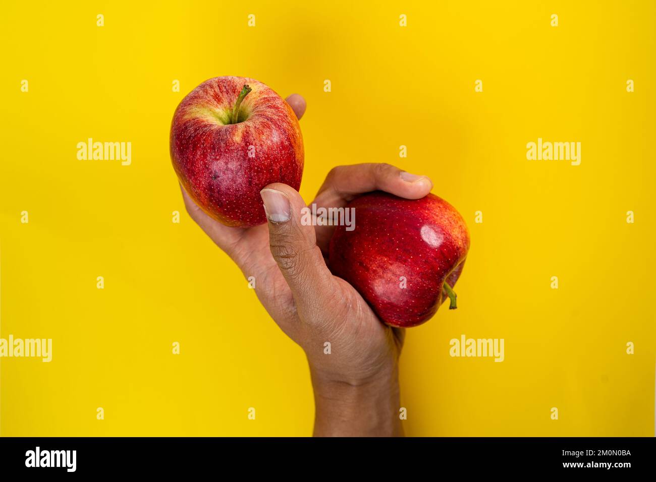 holding apple in the hand Stock Photo - Alamy