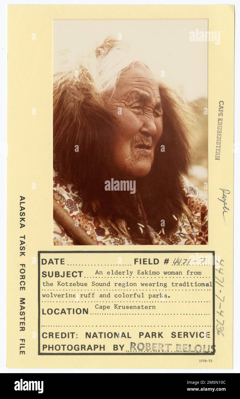 Elderly Eskimo woman from the Kotzebue Sound region wearing traditional ...