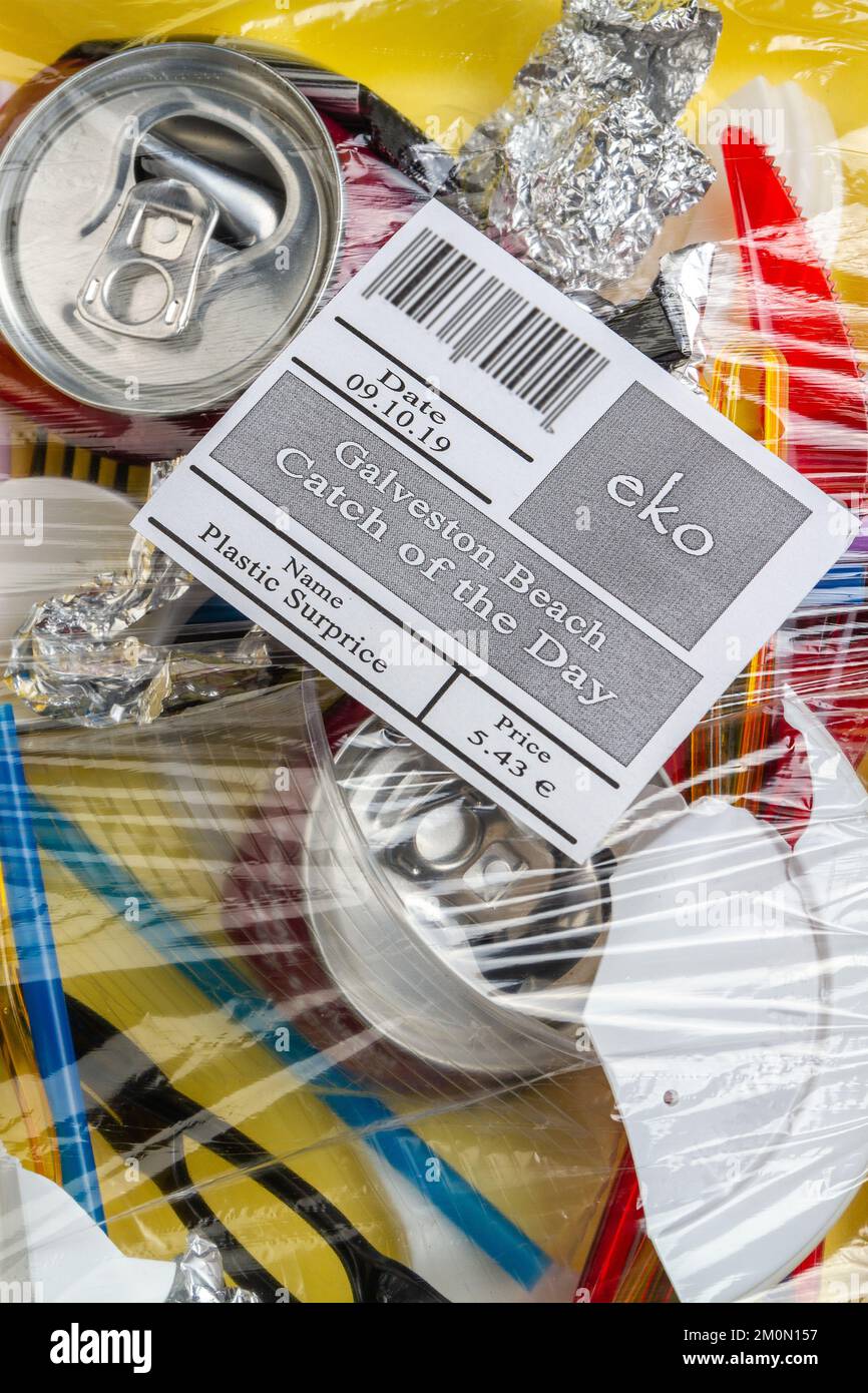 Vertical shot close up pile of various rubbish wrapped in plastic ...