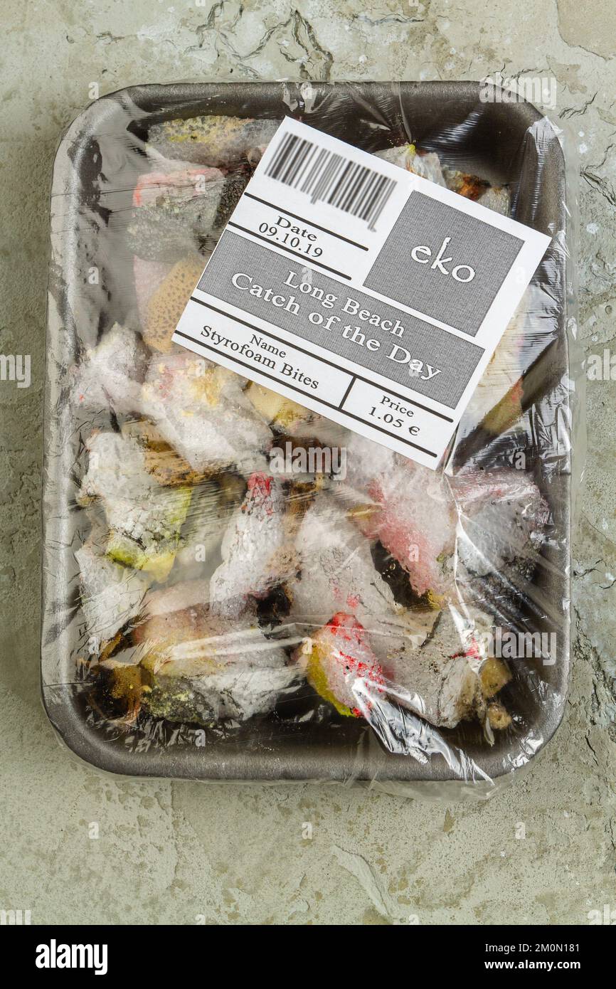 Top view frozen food wrapped in a plastic container. Seafood with label ...