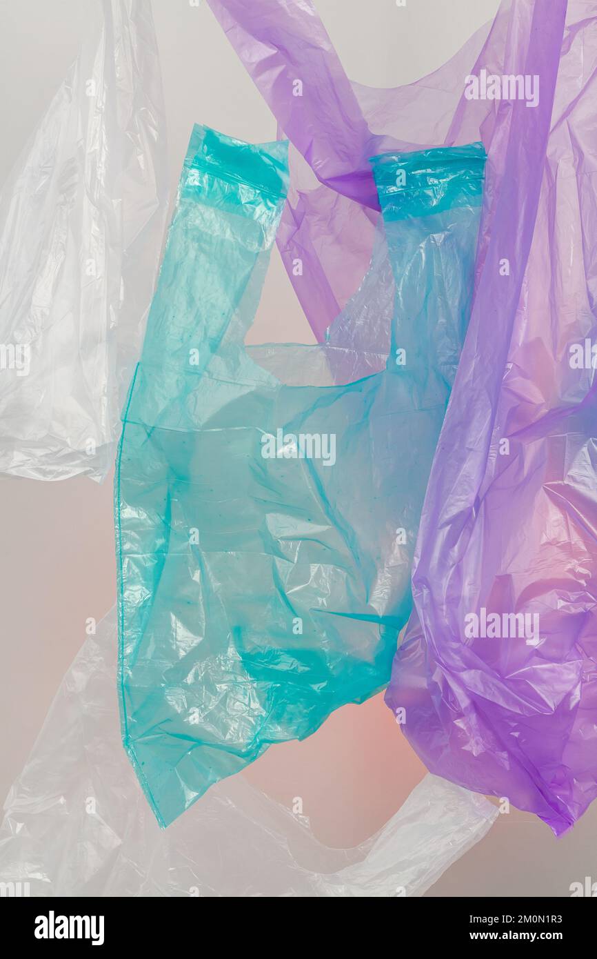 Vertical shot of various colorful plastic bags. New multicolored ...