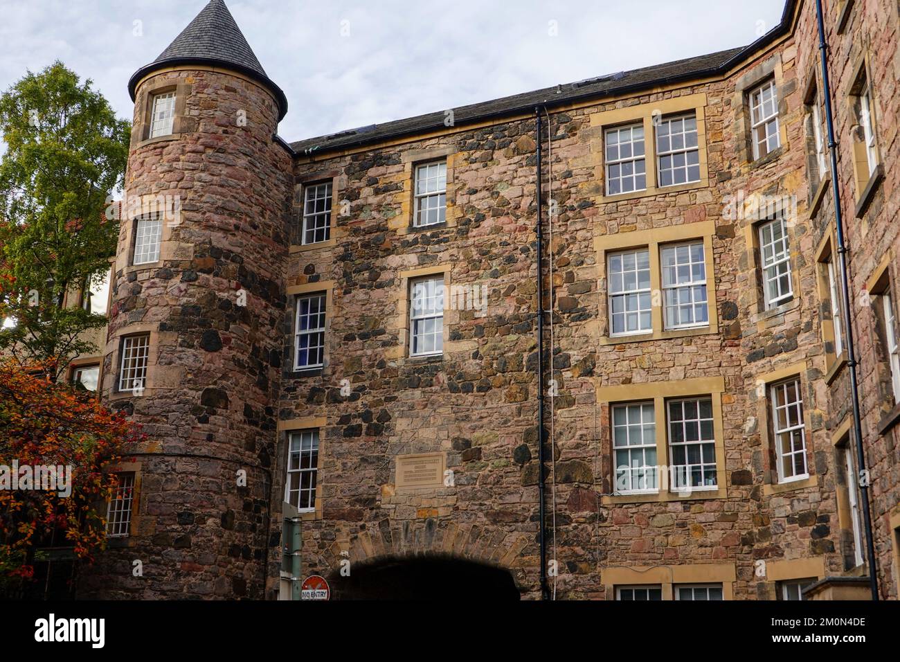 Historic stone building with tower, turret at St John's Land, The ...