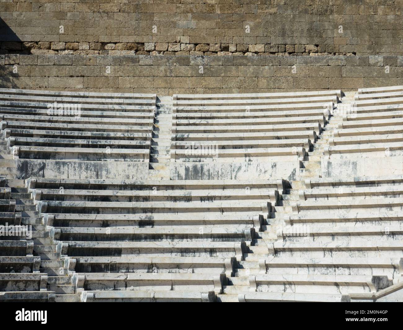 Odeon theater with marble seats and stairs. The Acropolis of Rhodes ...