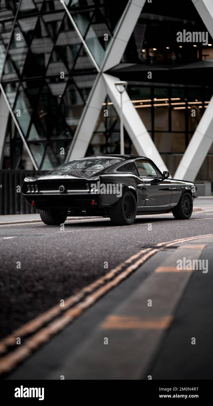 A vertical shot of EV supercar, Mustang electric car in the financial ...