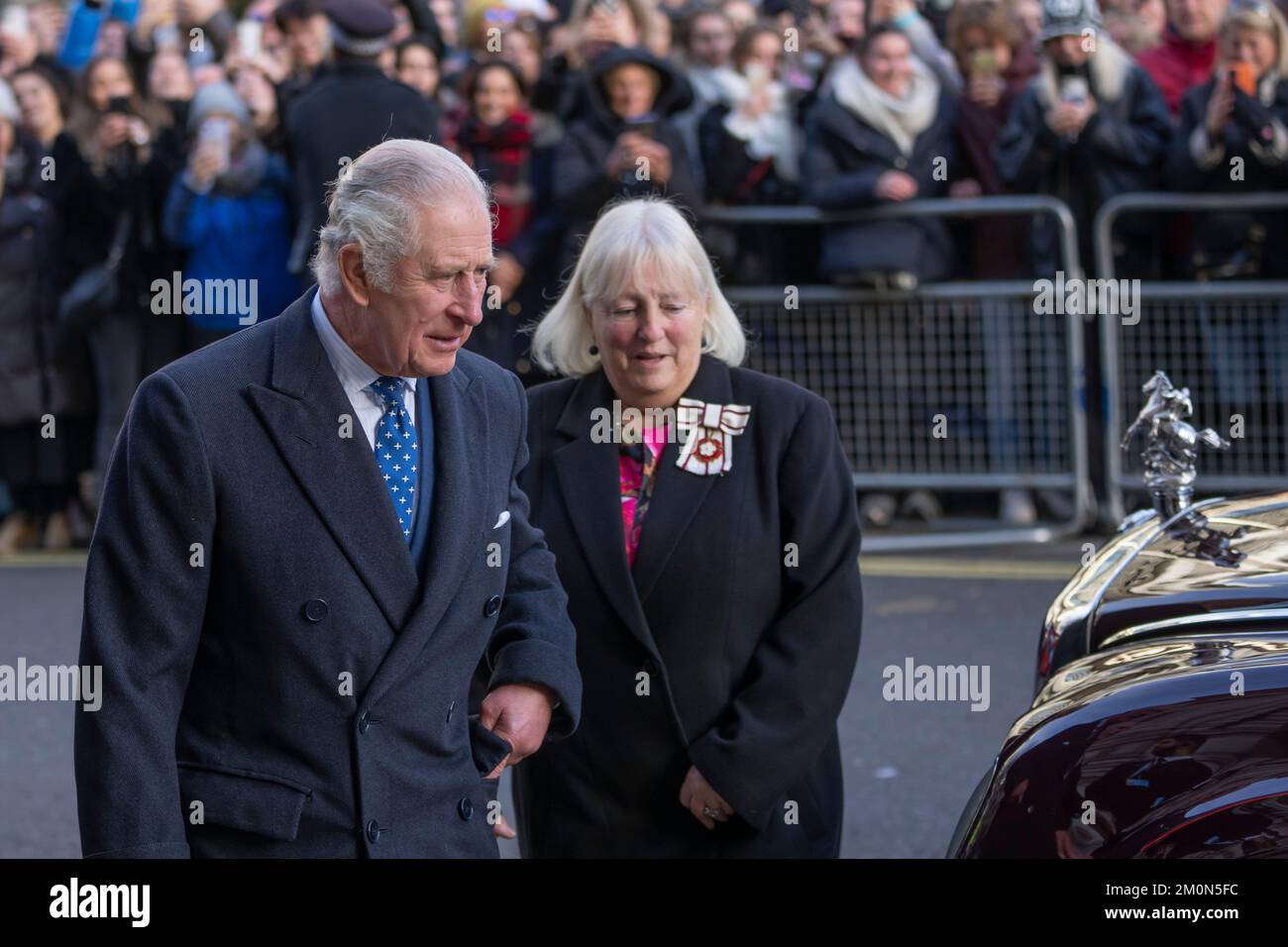 King Charles III is accompanied by Colonel Jane Davis, as he leaves ...