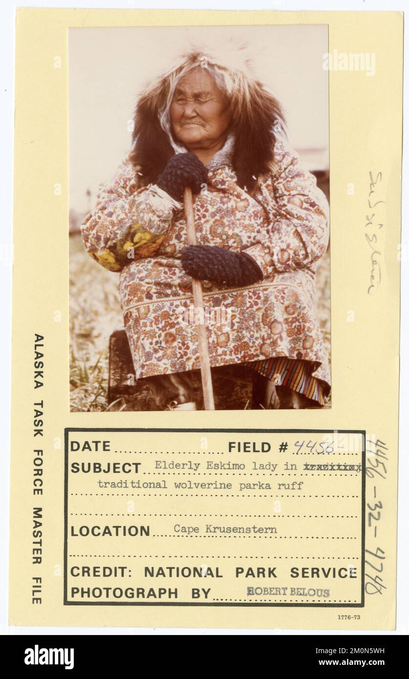 Elderly Eskimo lady in traditional wolverine parka ruff. Alaska Task ...