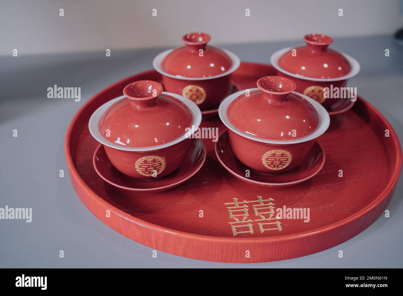 The traditional Chinese red cups with tea Stock Photo - Alamy