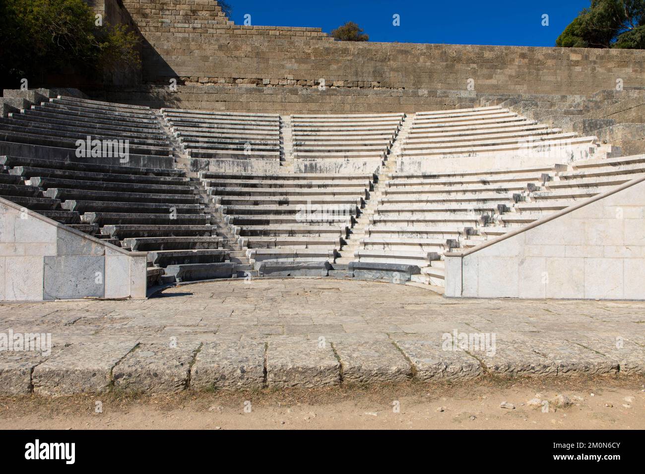 Odeon theater with marble seats and stairs. The Acropolis of Rhodes ...