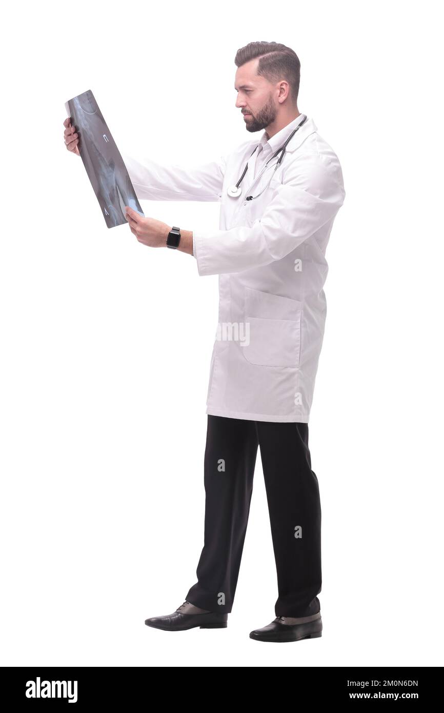 in full growth. medical doctor looking closely at the x-ray Stock Photo ...