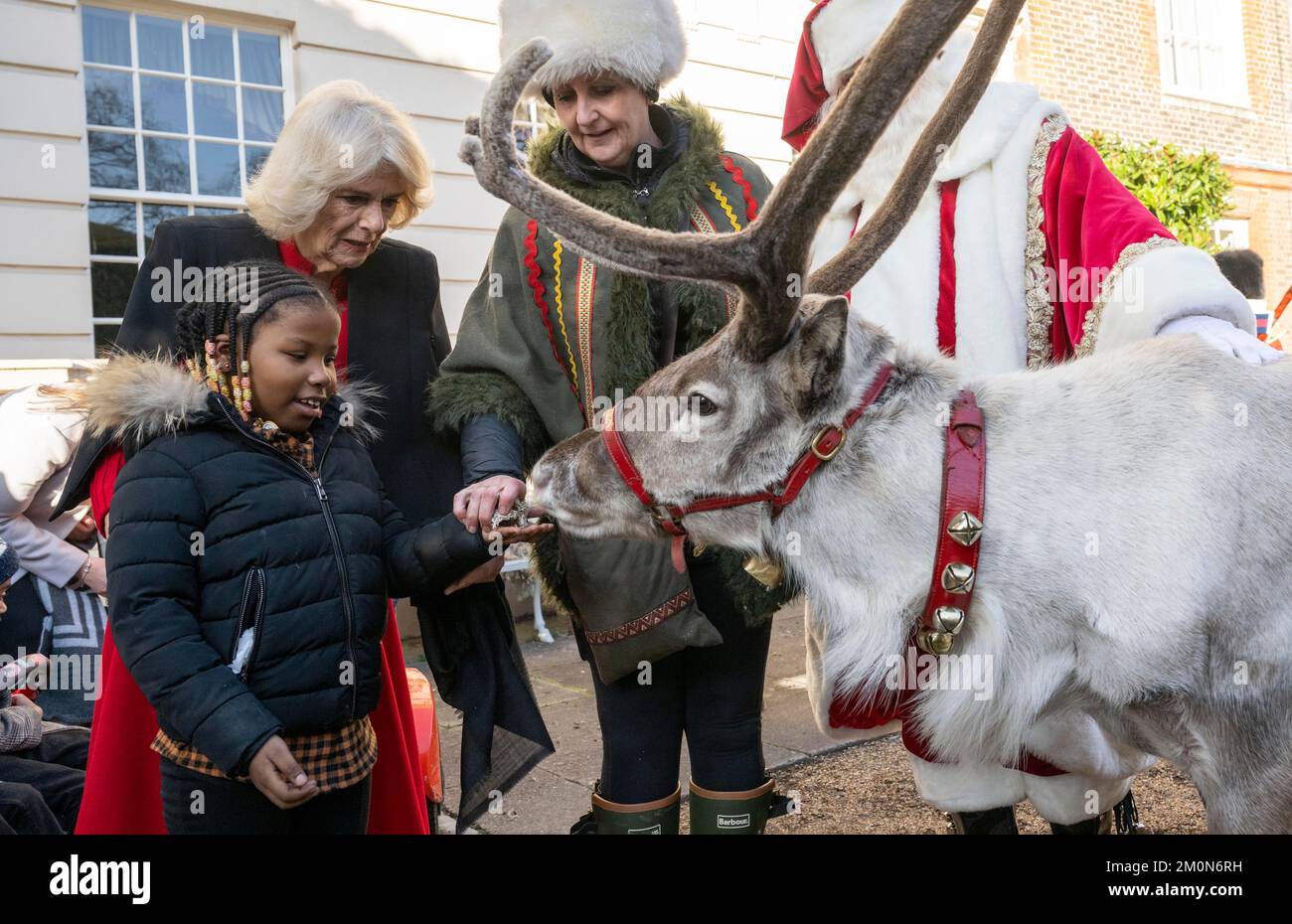 The Queen Consort (second left) and Mayann MacNeil-Thompson, seven ...