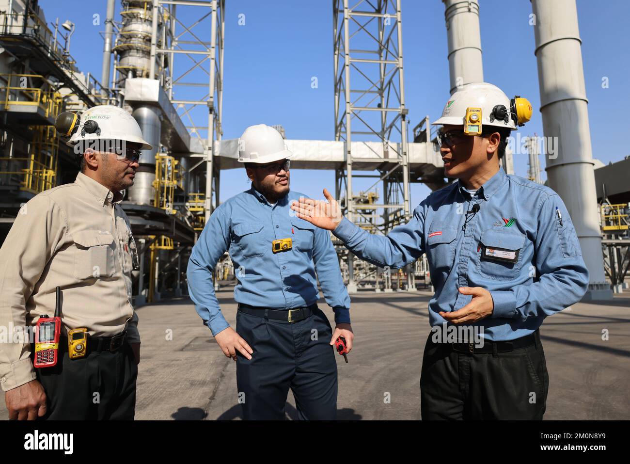 Riyadh, Saudi Arabia. 27th Nov, 2022. Workers communicate at the Yanbu ...