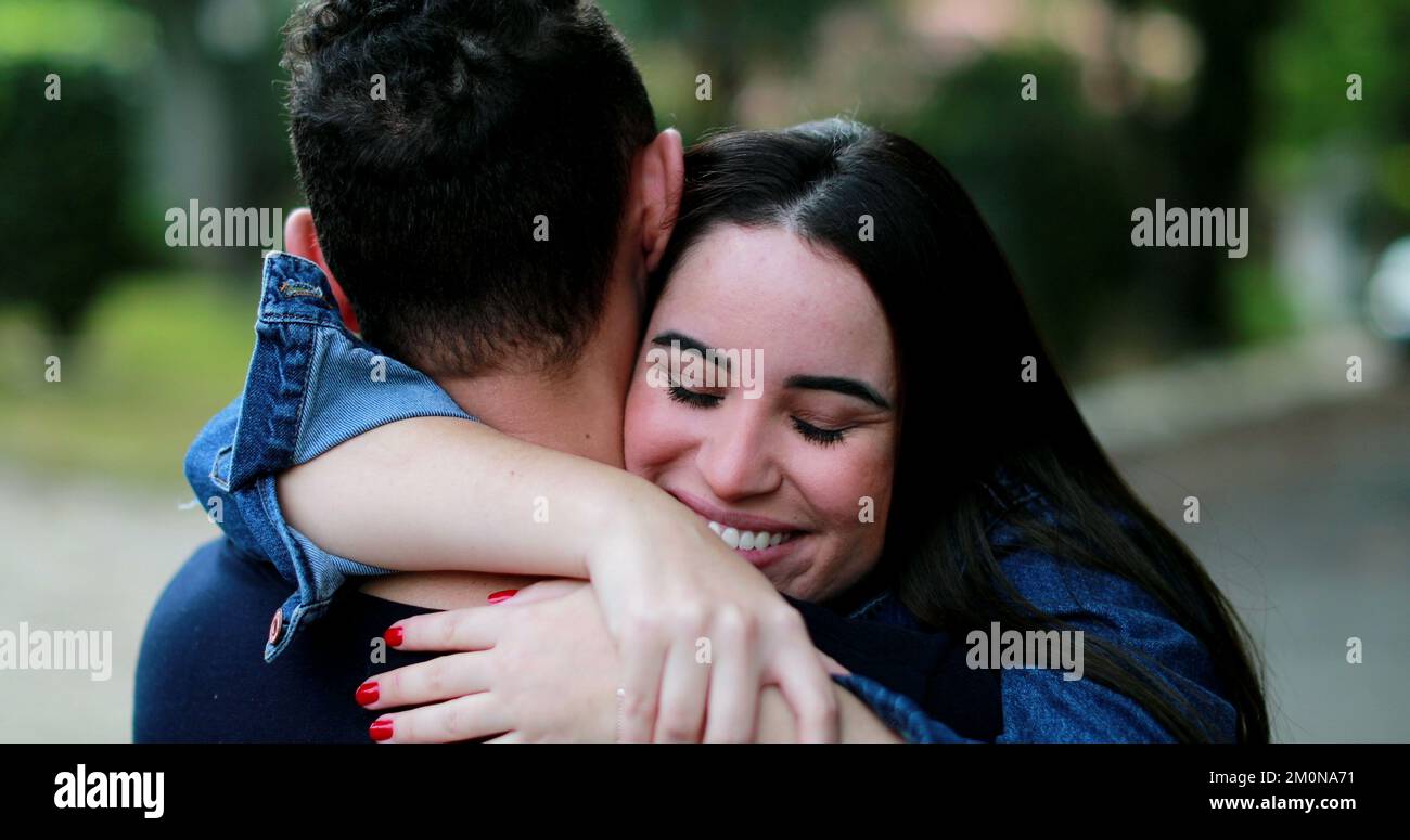Woman embracing boyfriend, loving caring relationship, couple reunion ...