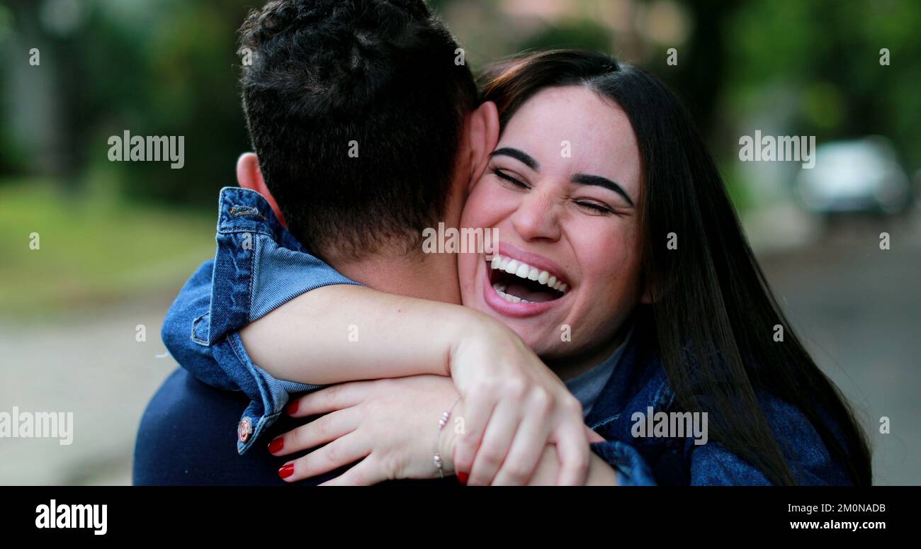 Woman embracing boyfriend, loving caring relationship, couple reunion ...