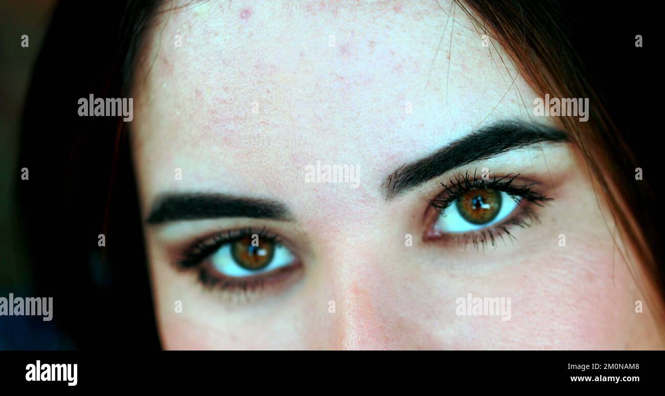 Young woman eyes staring at camera, macro close-up face Stock Photo - Alamy