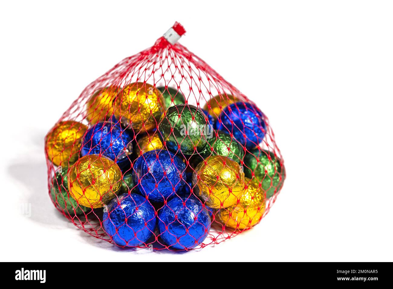 Chocolate balls wrapped in aluminum foil Stock Photo - Alamy