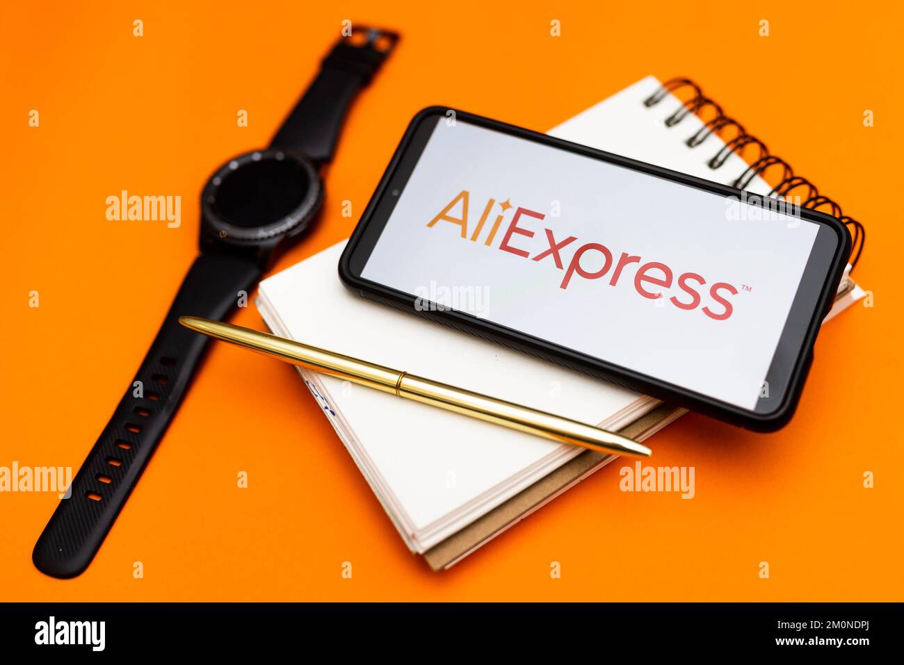 In this photo illustration an AliExpress logo seen displayed on a ...