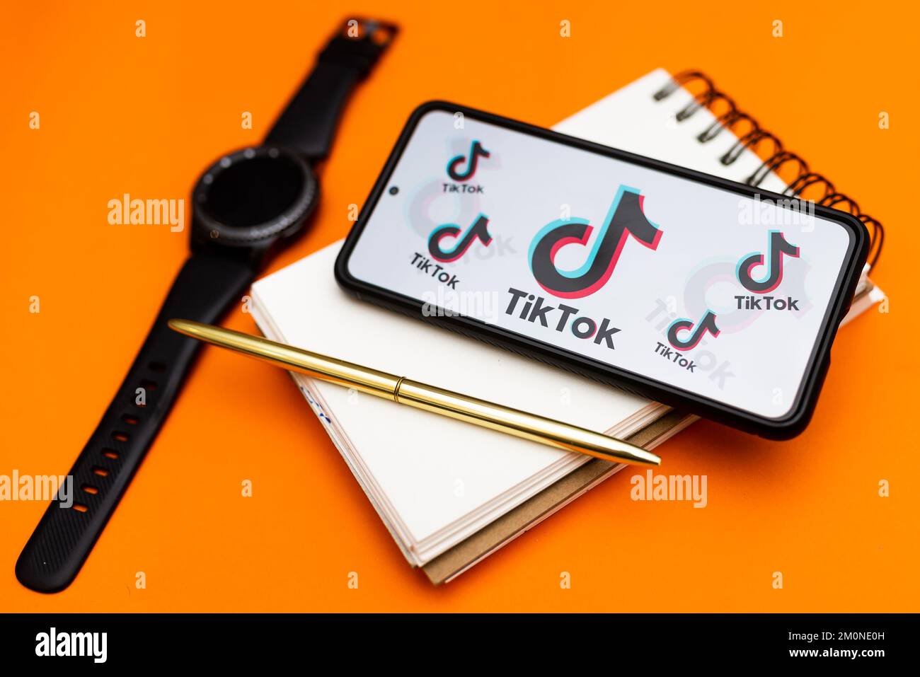 In this photo illustration a TikTok logo seen displayed on a smartphone ...