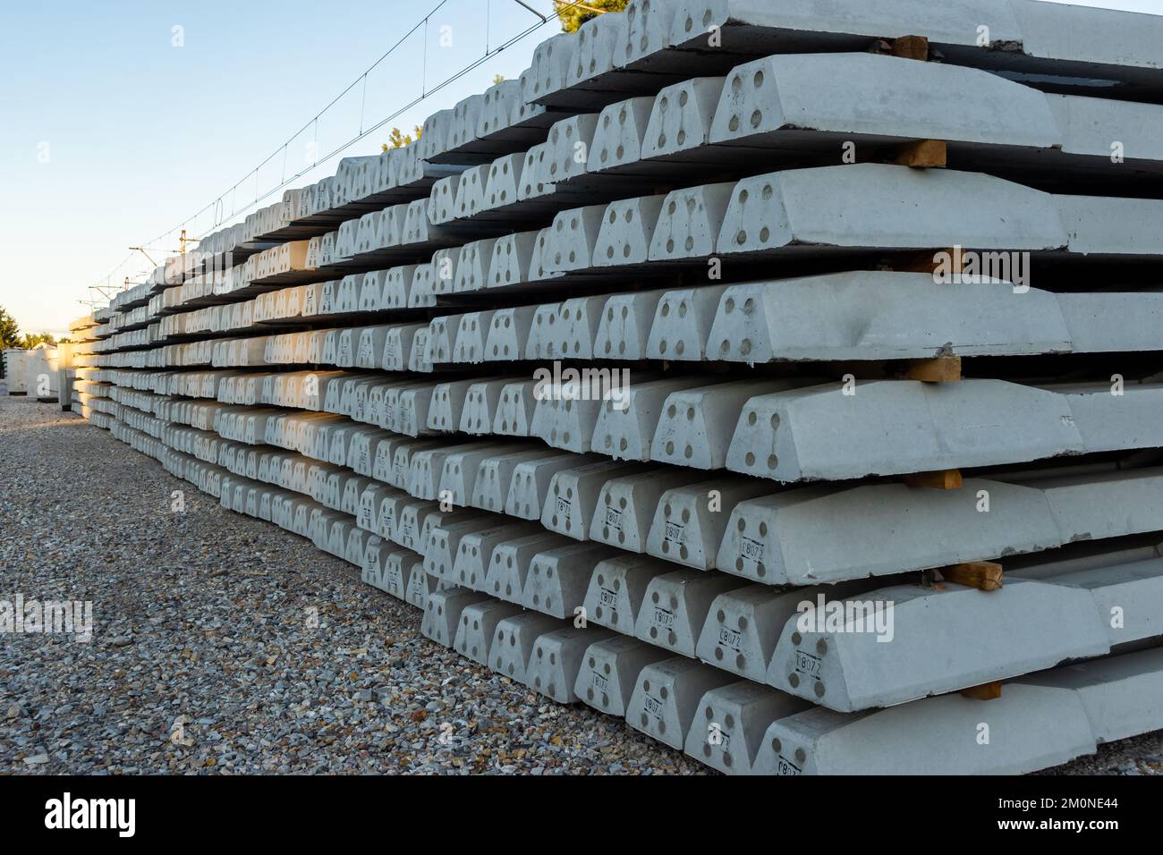 Stacks of concrete railway sleepers at the construction site of a new ...