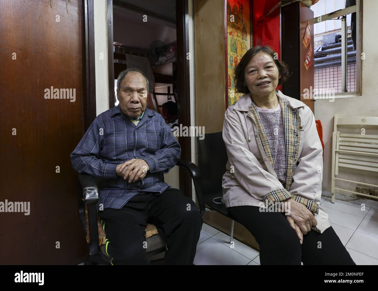 (L-R) Mr Tam and Ms Man, resident and owner of the building at Kwai ...