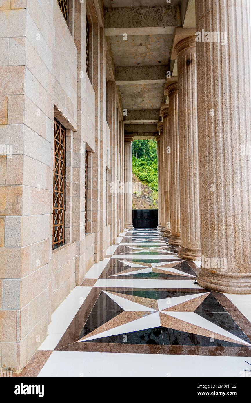 A vertical shot of an outdoor corridor with columns Stock Photo - Alamy