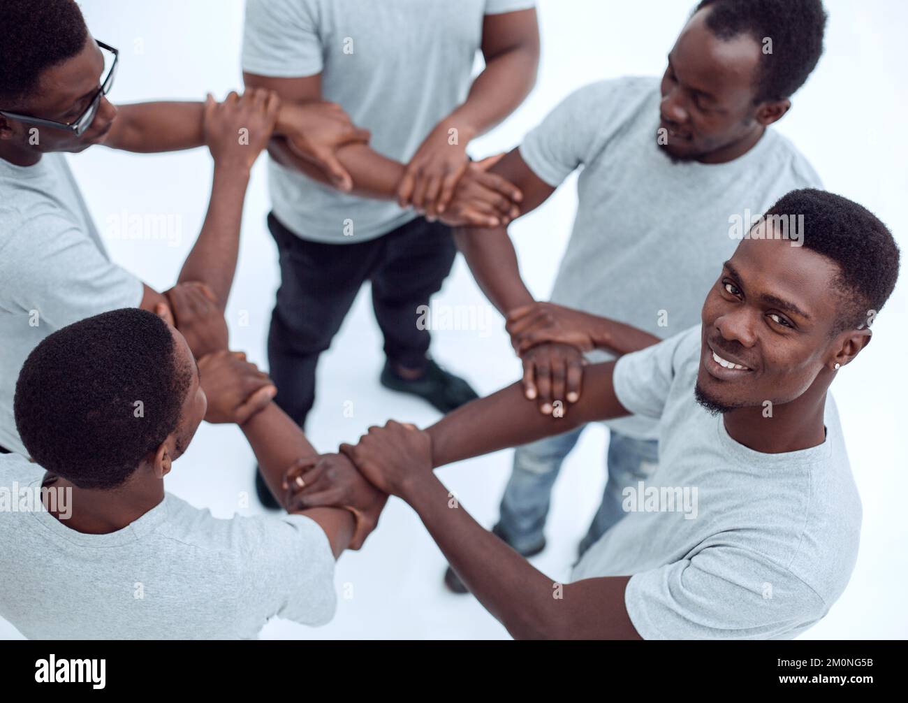 group of diverse guys standing in a circle . isolated on white Stock ...