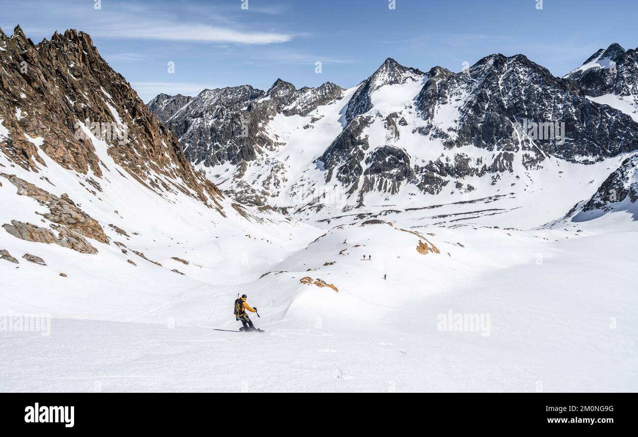Splitboarders on the descent at Verborgen-Berg Ferner, behind summit ...